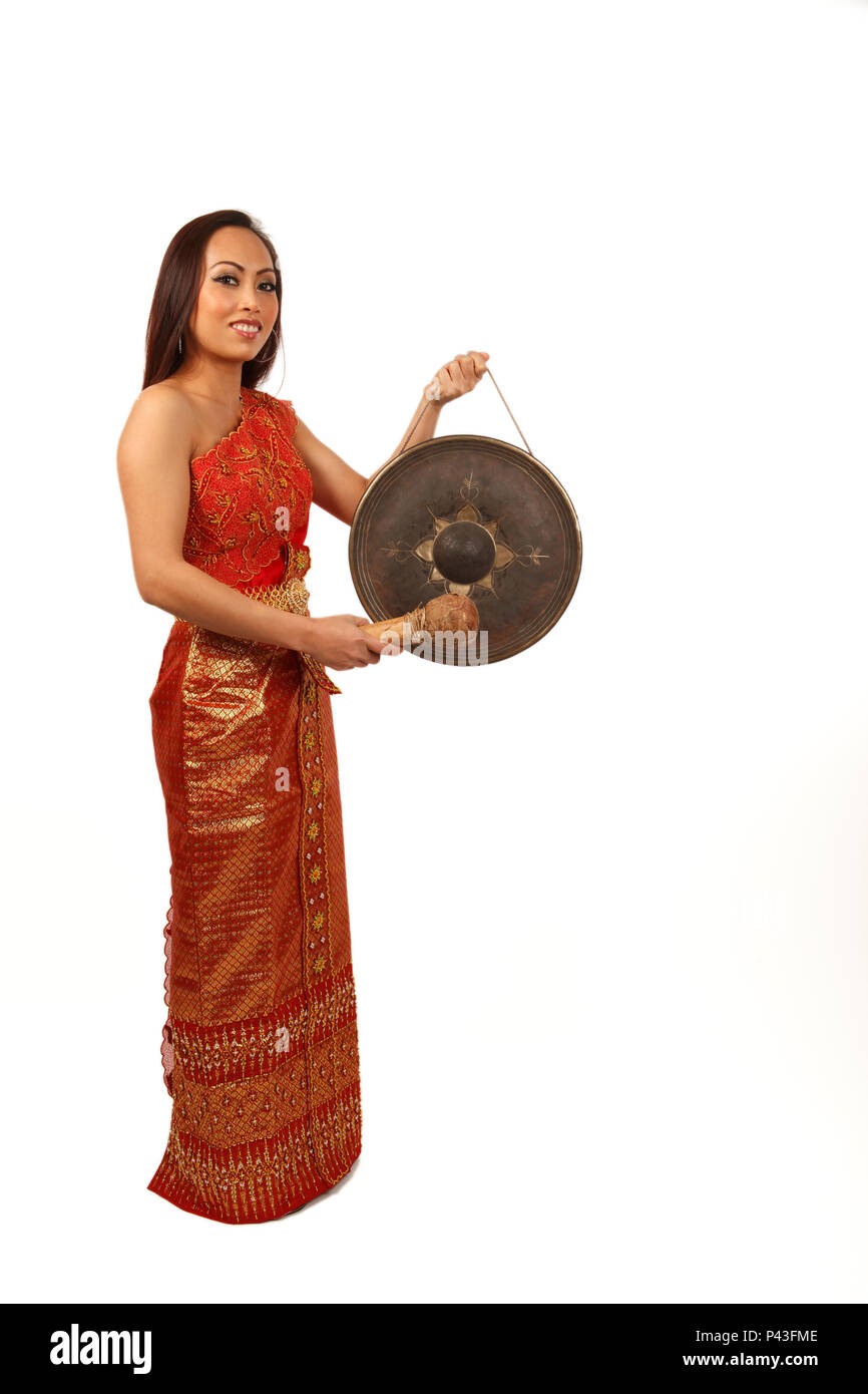 Woman playing a gong hi-res stock photography and images - Alamy