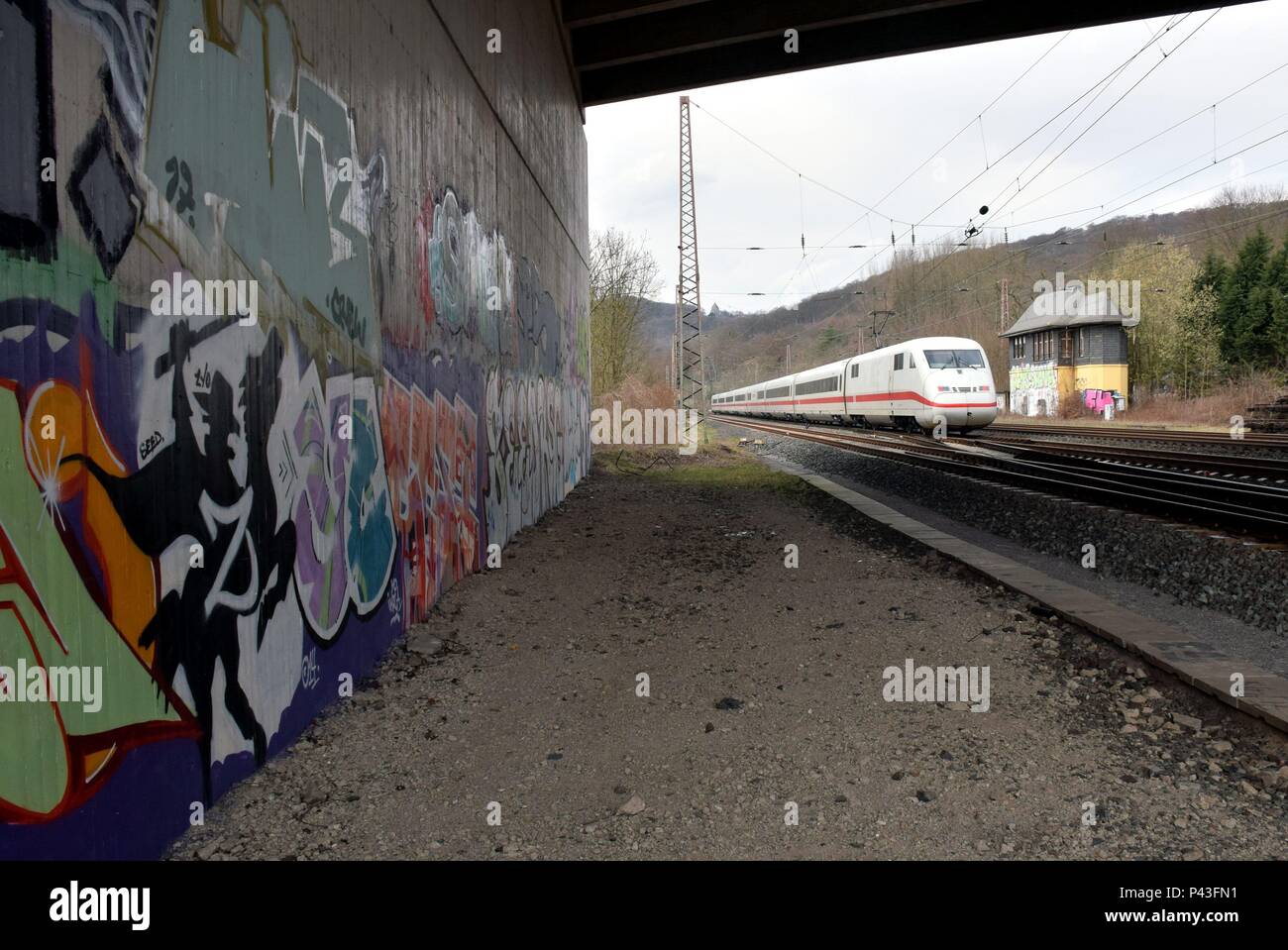 Intercity and Graffiti with rider with sword on 02.04.2018 on bridge ...