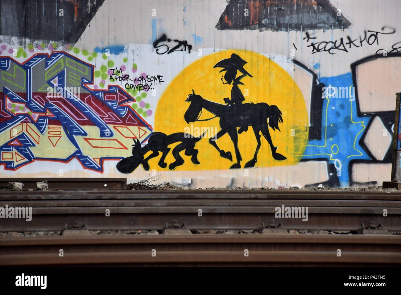 Graffiti with cowboy on 01.05.2018 on bridge pier in Schwerte - Germany ...