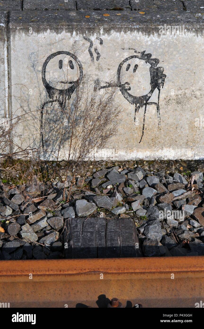 Graffiti with two faces on Platform on 09.04.2016 in Oberhausen ...