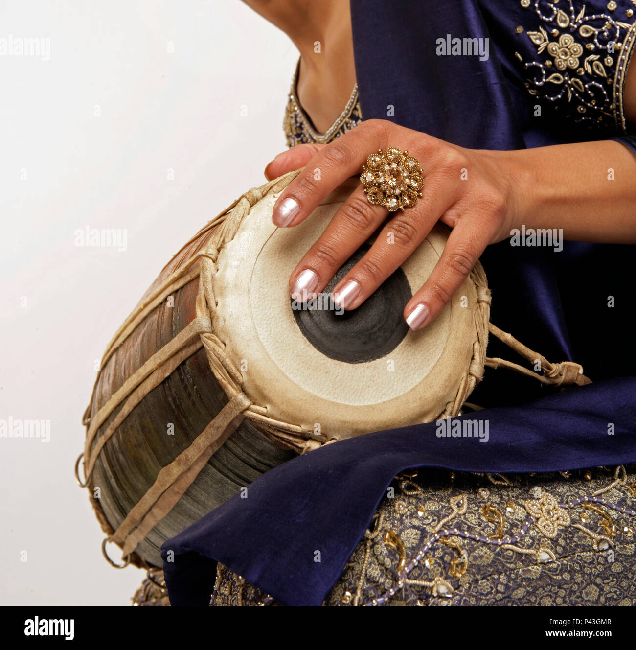 Young indian woman playing drum hi-res stock photography and images - Alamy