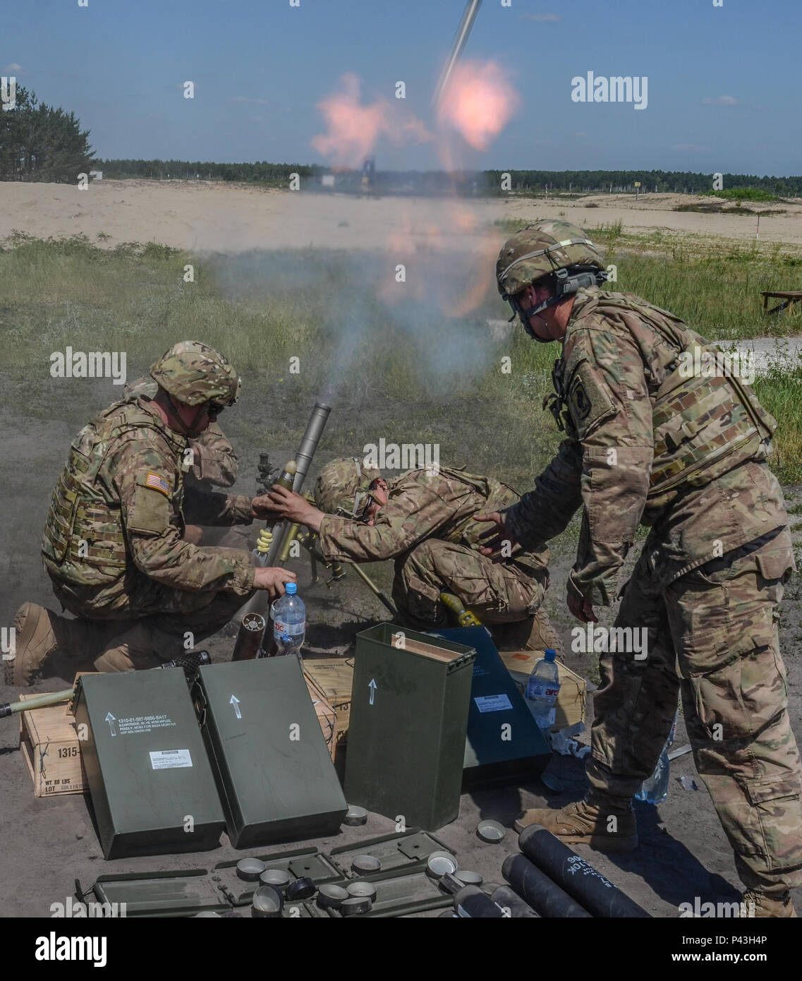 Soldiers from A Troop, 1st Squadron, 91st Cavalry Regiment fire a 60mm ...