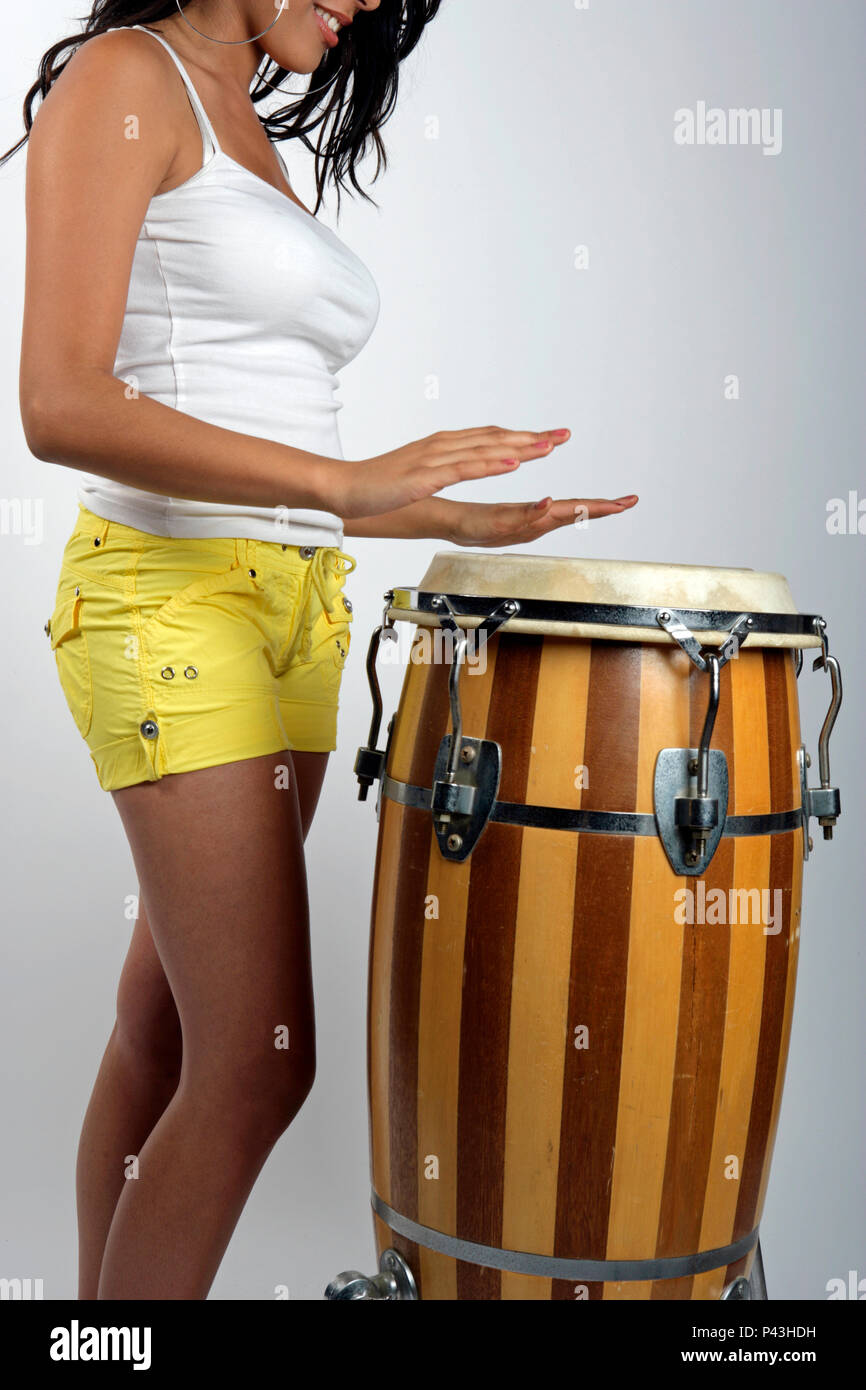 Brazilian girl playing congas Stock Photo - Alamy