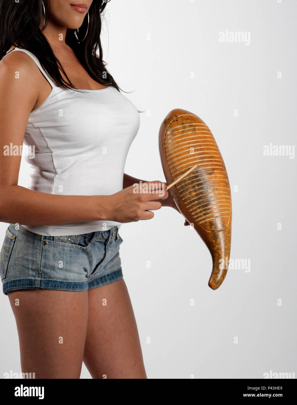 Guiro player hi-res stock photography and images - Alamy