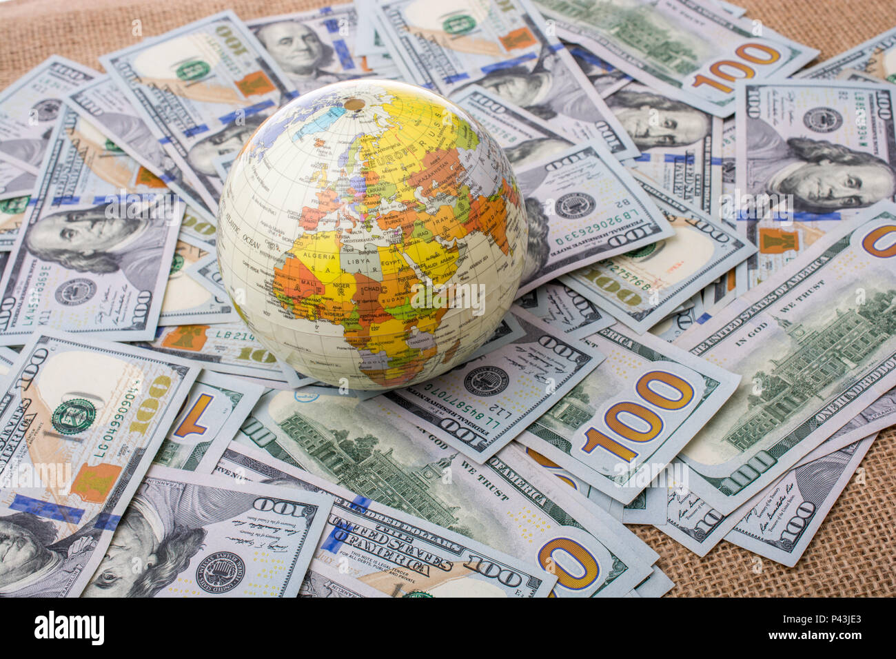 Stack banknotes globe hi-res stock photography and images - Alamy