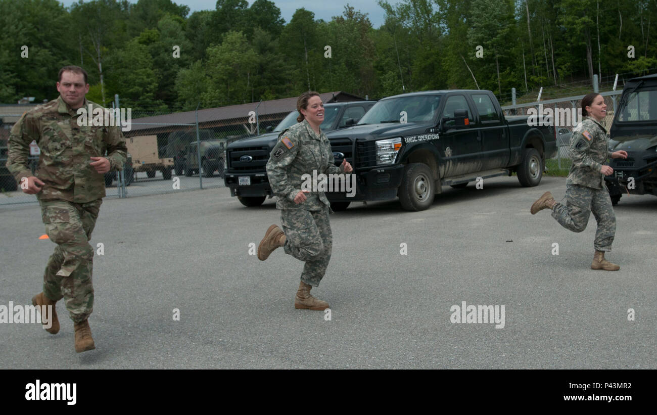 (From left to right), U.S. Army Sgt. Jeremy Nadeau, Sgt. Erynn Hazlett ...