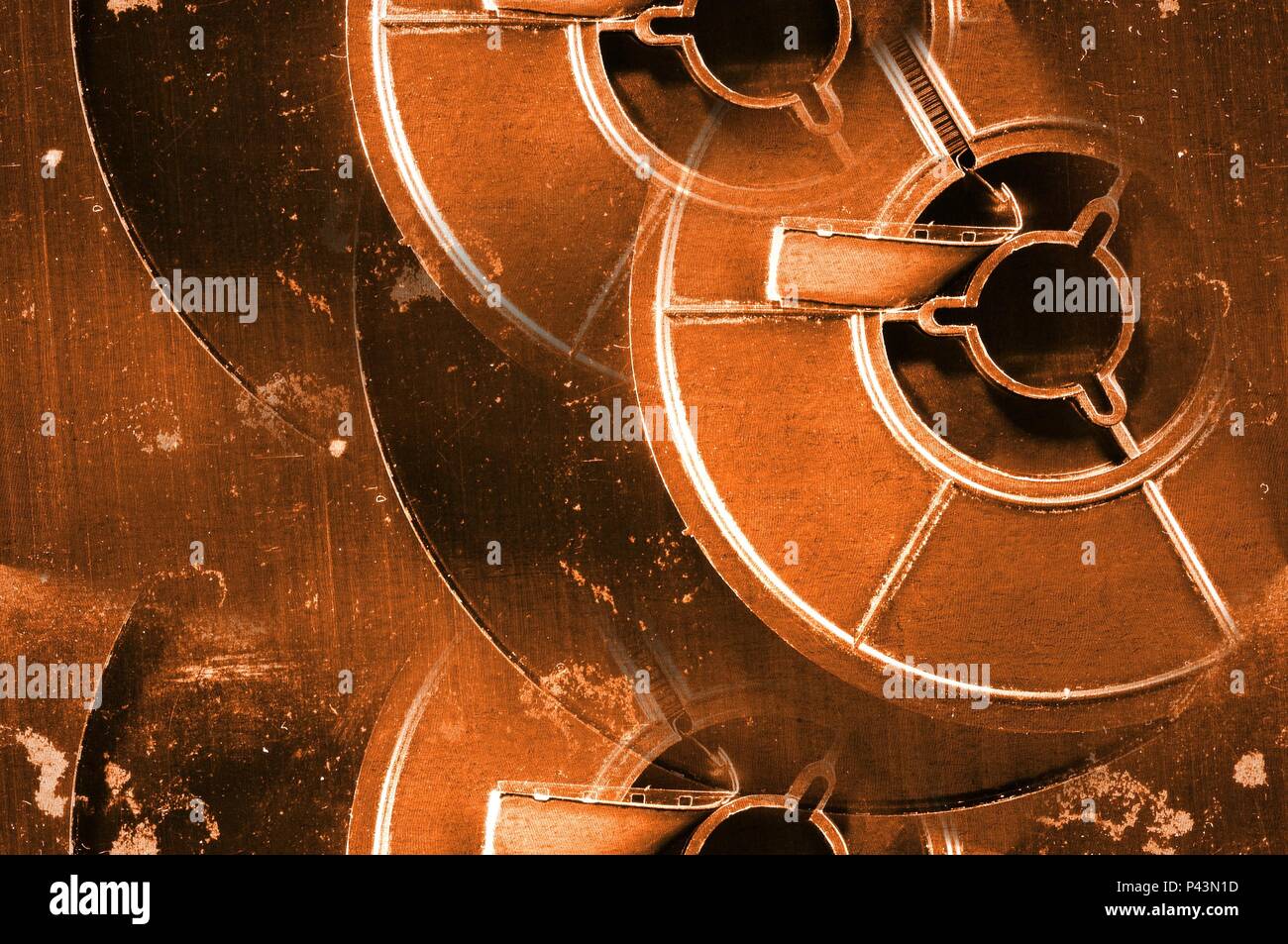 Old film reel on a scratched and rusty metal background Stock Photo - Alamy