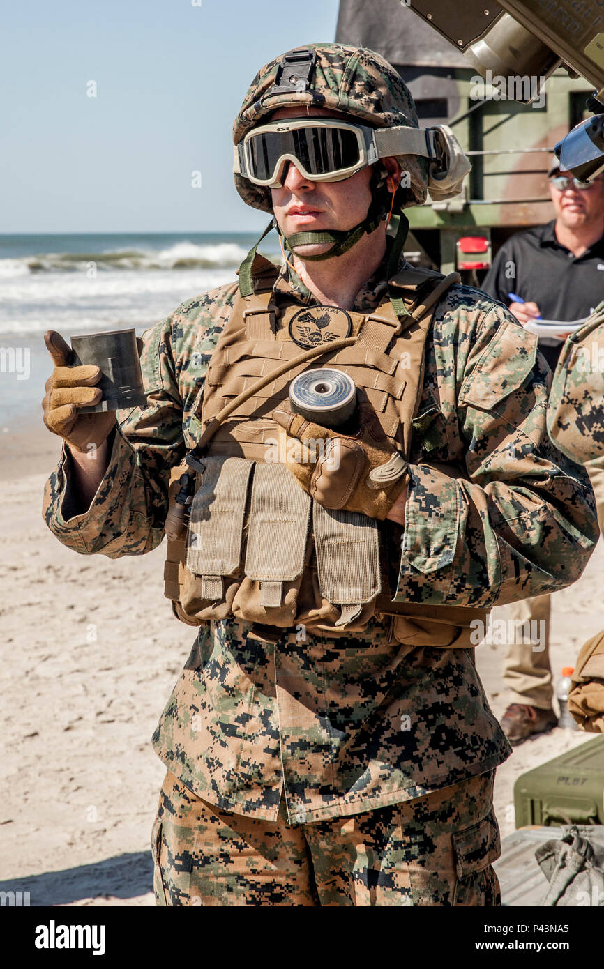 U.S. Marine Corps Cpl. Colton J. Miller, a gunner assigned to 2nd Low ...