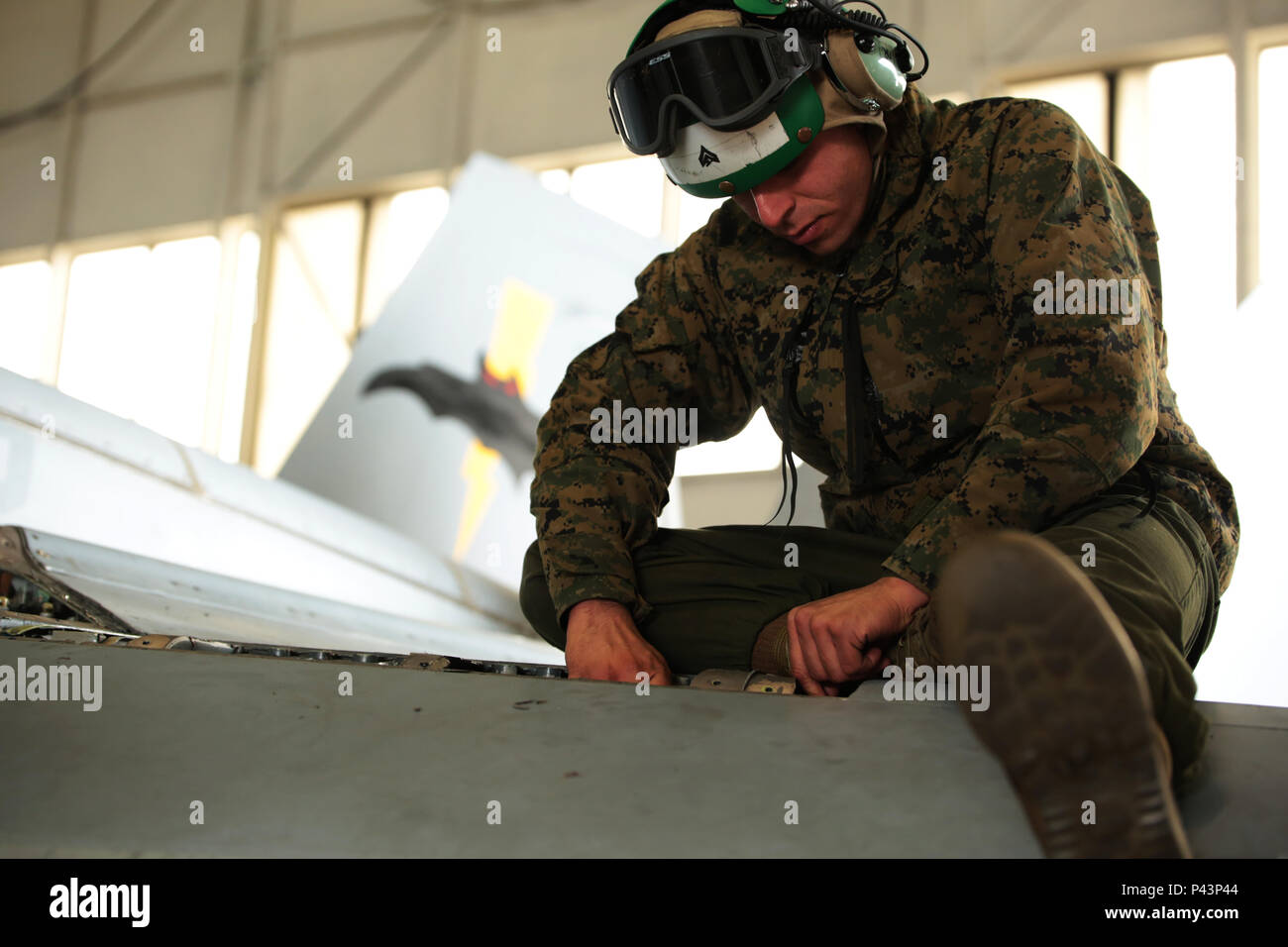 U.S. Marine Corps Cpl. Ivan Robledo, an airframe mechanic with Marine ...
