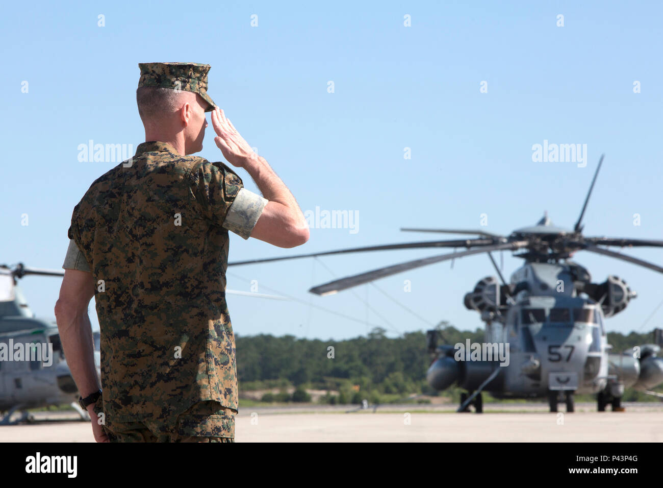 Maj. Gen. Gary L. Thomas salutes during the 2nd Marine Aircraft Wing ...