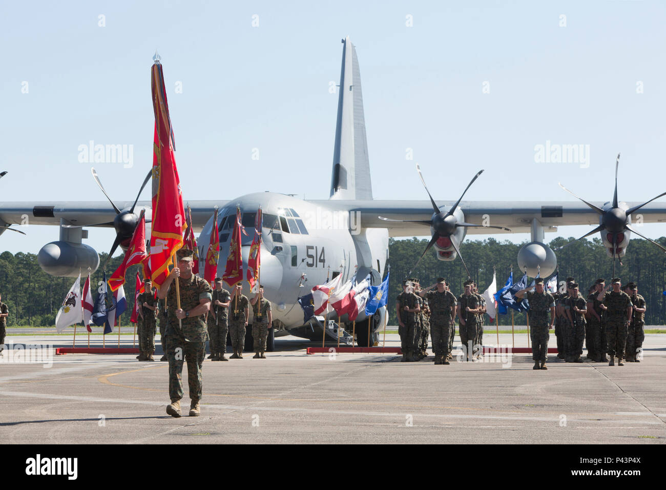 Sgt. Maj. Richard D. Thresher delivers the Marine Corps colors during ...