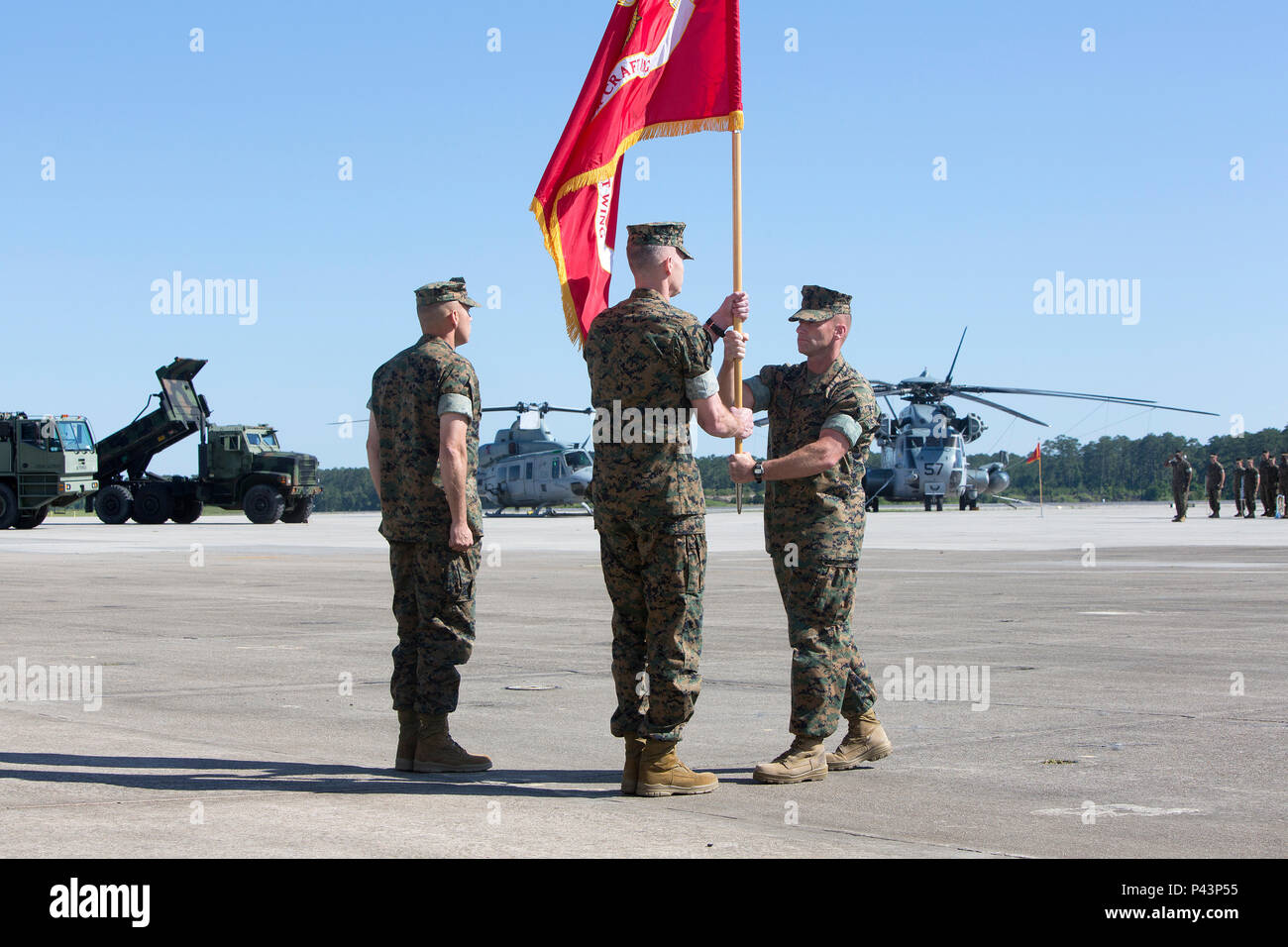 Sgt. Maj. Richard D. Thresher delivers the Marine Corps colors during ...