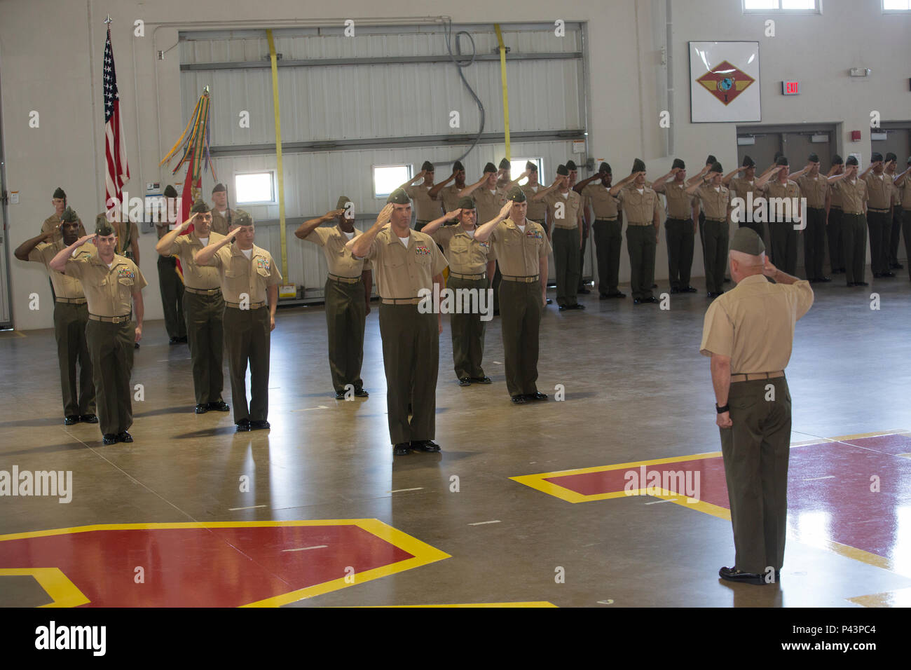 U.S. Marines and their family members attend a change of command ...