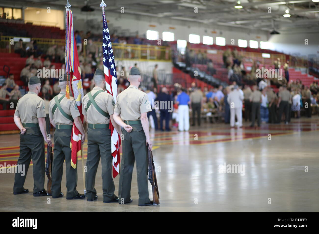 U.S. Marines and their family members attend a change of command ...
