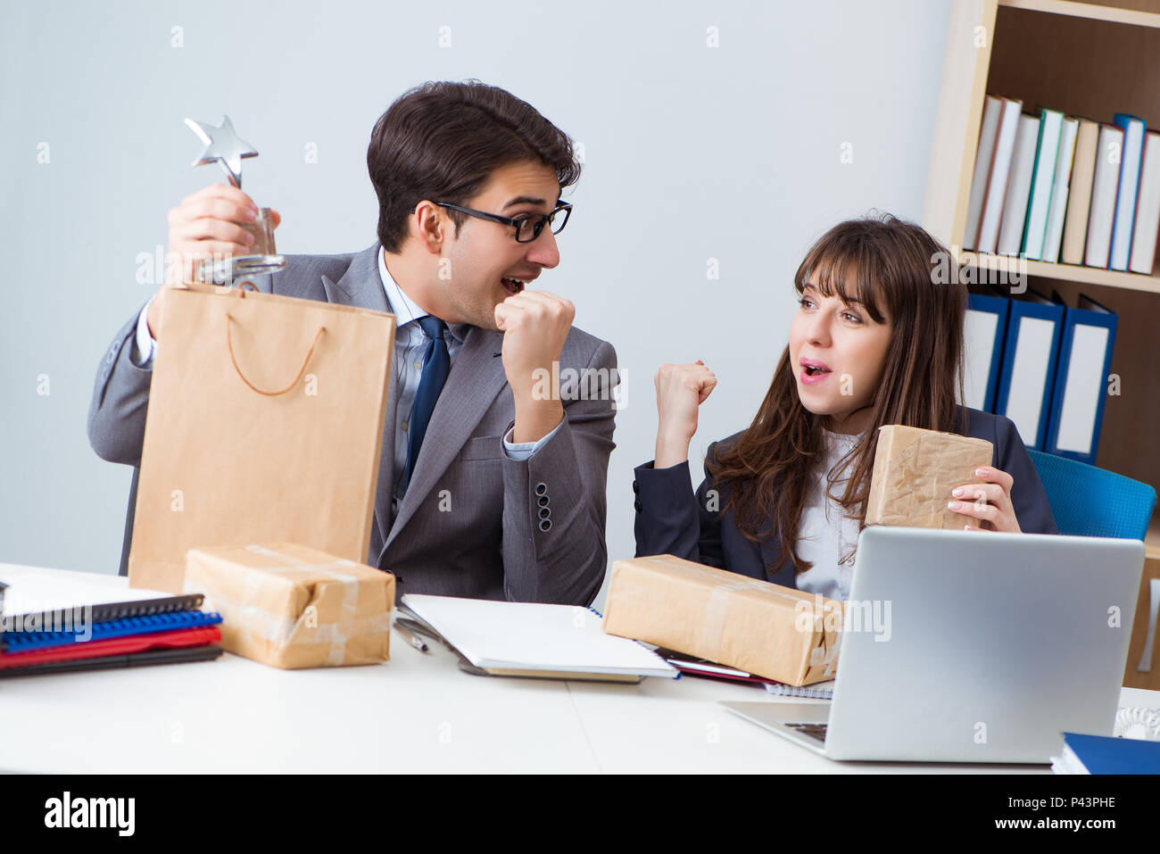 Business people receiving new mail and parcels Stock Photo - Alamy