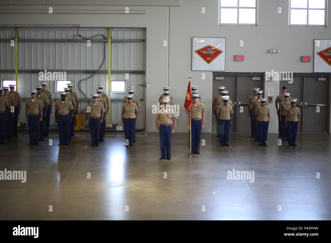 U.S. Marines and their family members attend a change of command ...