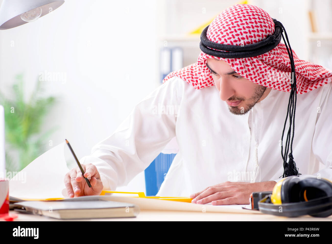 Arab engineer working on new project Stock Photo - Alamy