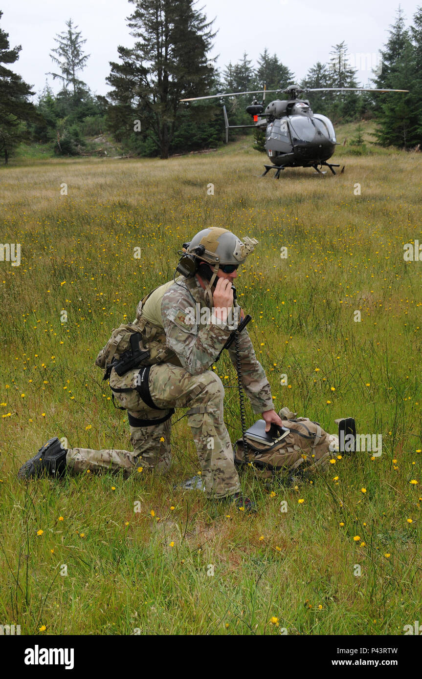 Capt. Kenneth Lukens II, 125th Special Tactics Squadron, talks to the ...