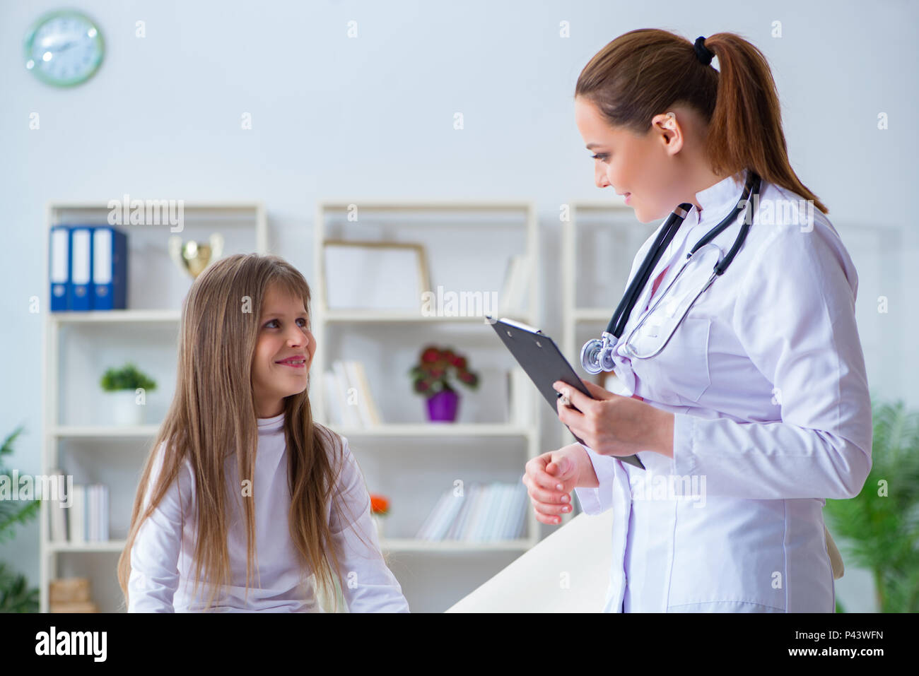 Female doctor pediatrician checking girl Stock Photo - Alamy Female doctor pediatrician checking girl Stock Photo - Alamy