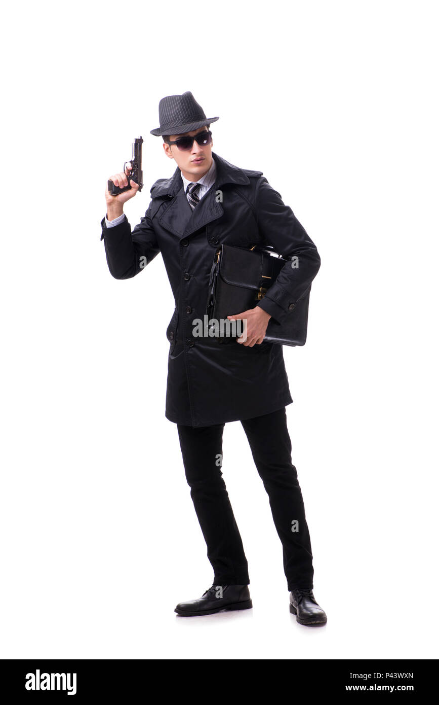 Man spy with handgun isolated on white background Stock Photo - Alamy