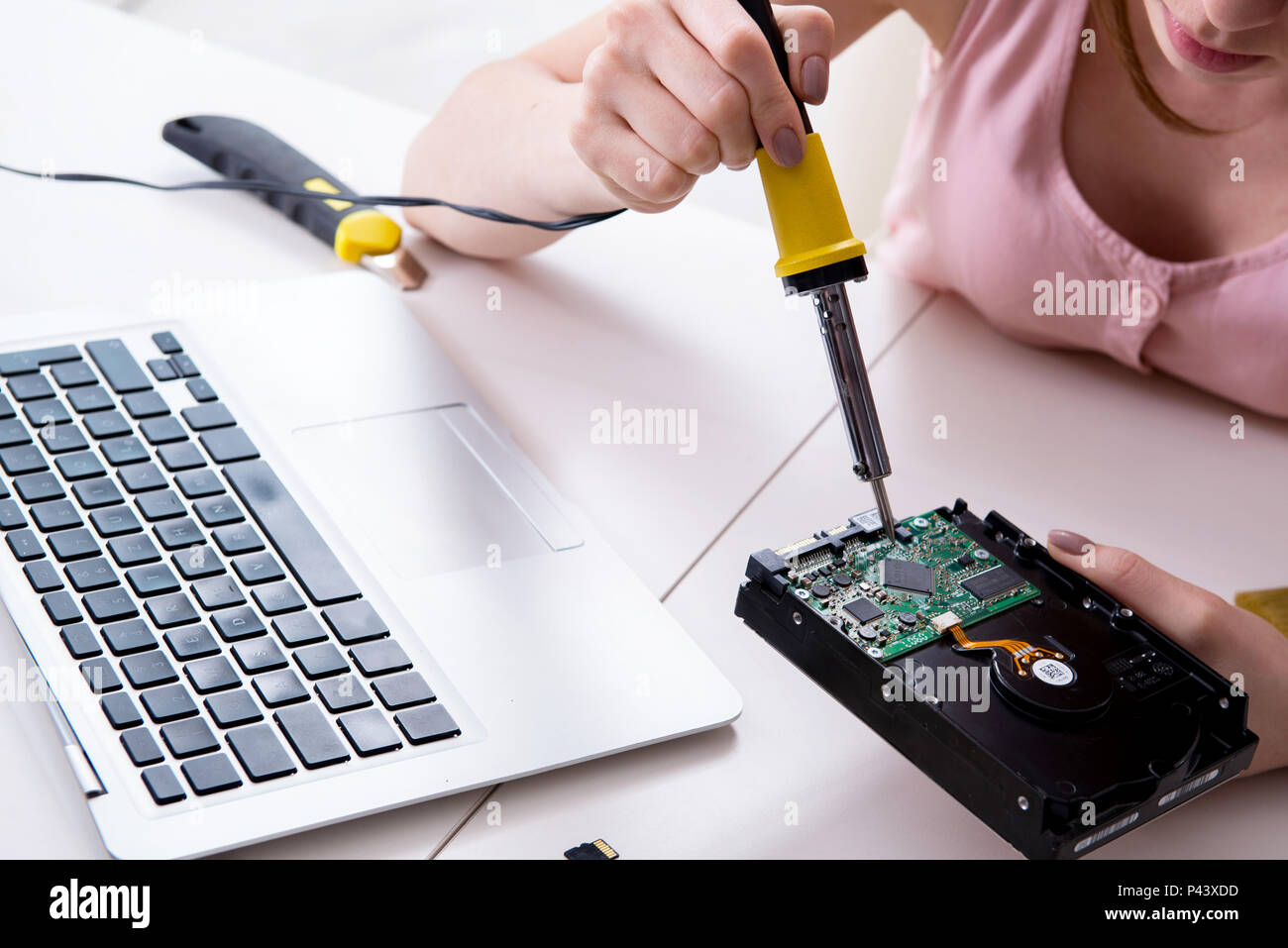 Hard drive repair and data recovery with restoration Stock Photo - Alamy