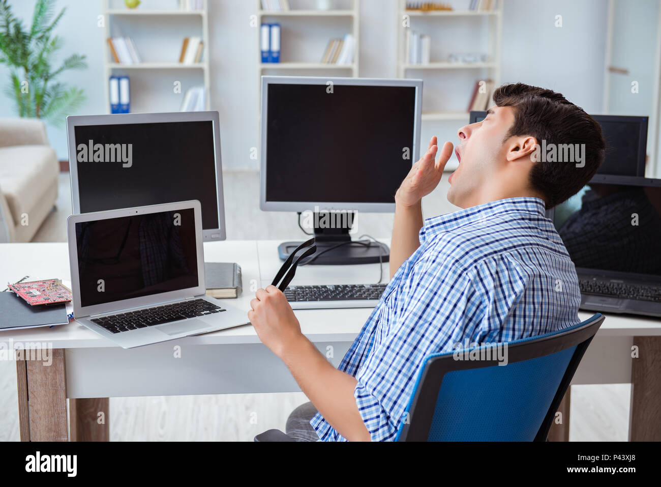 Man in front of many screens hi-res stock photography and images - Alamy