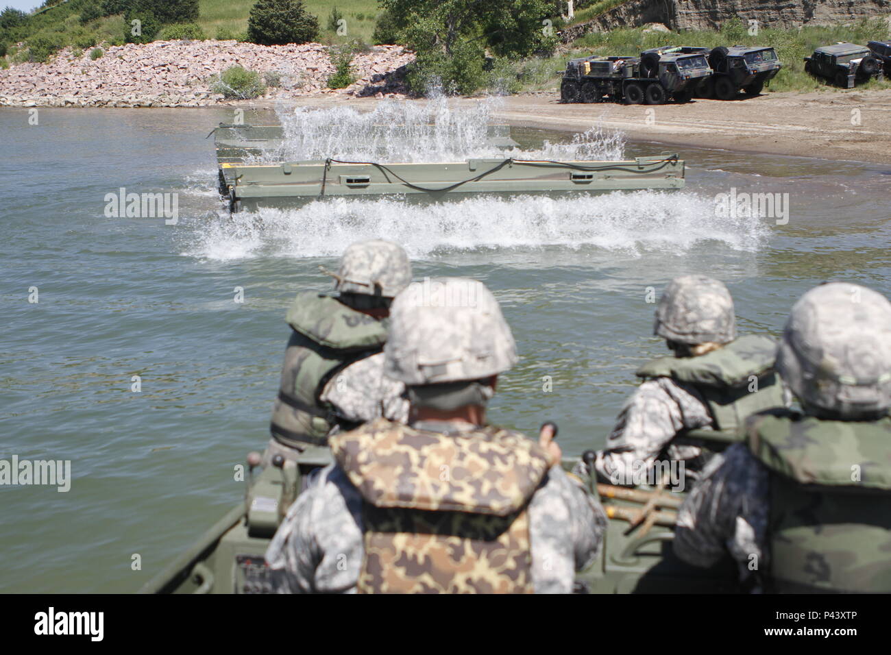 U.S. Army soldiers with the 200th Engineer Multi-Role Bridge Company ...