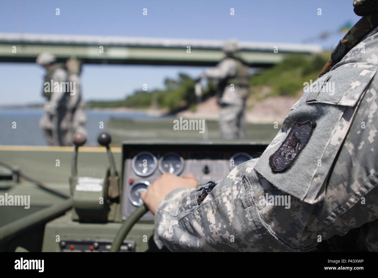 U.S. Army soldiers with the 200th Engineer Multi-Role Bridge Company ...