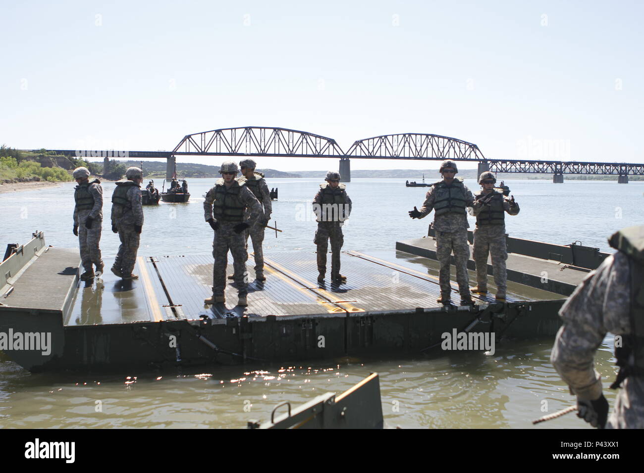 U.S. Army soldiers with the 200th Engineer Multi-Role Bridge Company ...
