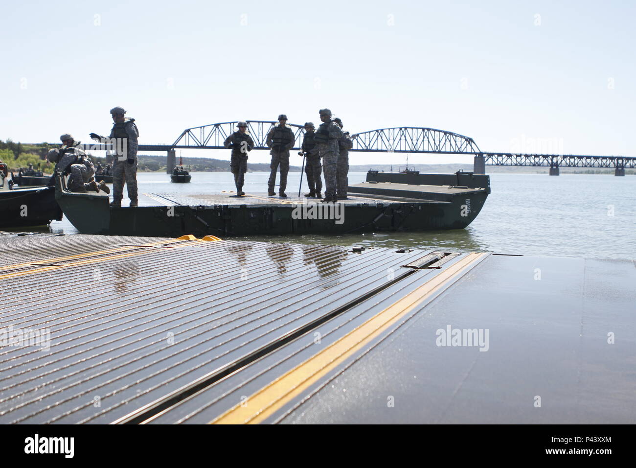 U.S. Army soldiers with the 200th Engineer Multi-Role Bridge Company ...