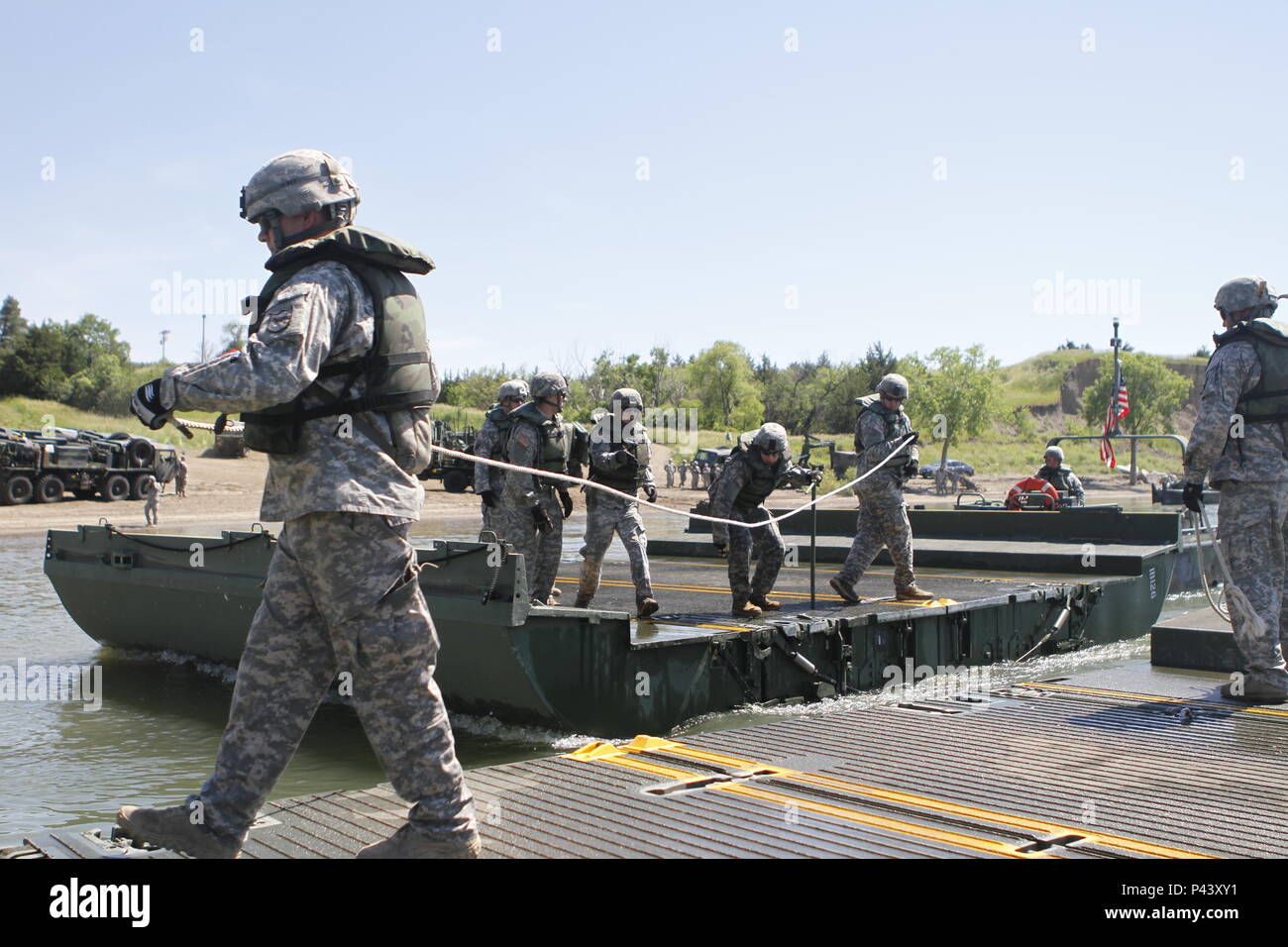 U.S. Army soldiers with the 200th Engineer Multi-Role Bridge Company ...