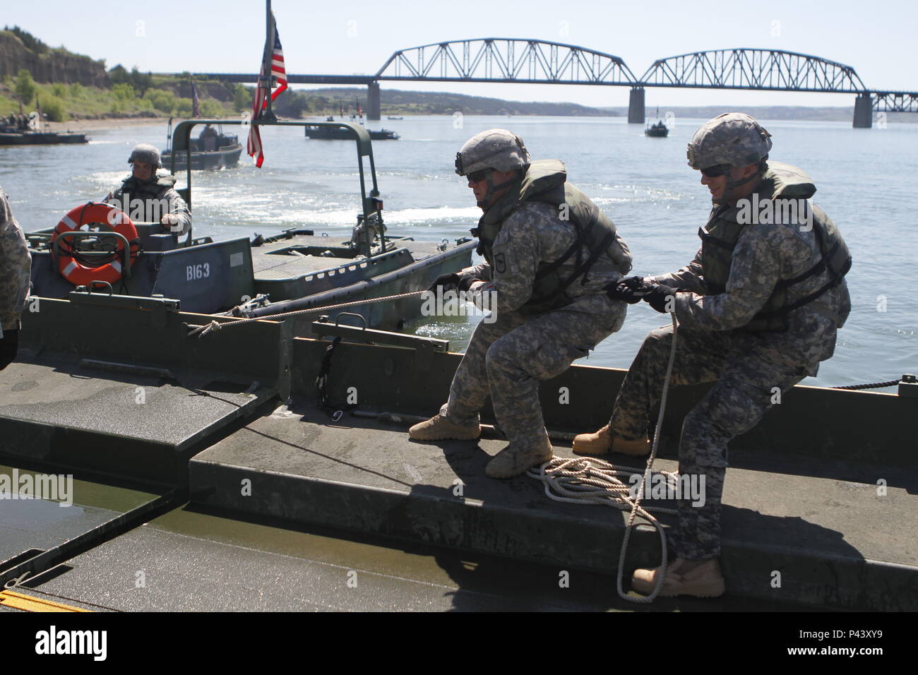 U.S. Army soldiers with the 200th Engineer Multi-Role Bridge Company ...