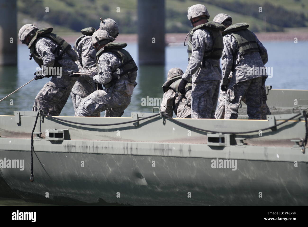 U.S. Army soldiers with the 200th Engineer Multi-Role Bridge Company ...