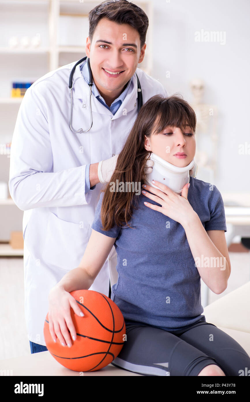Female basketball player visiting doctor after injury Stock Photo - Alamy