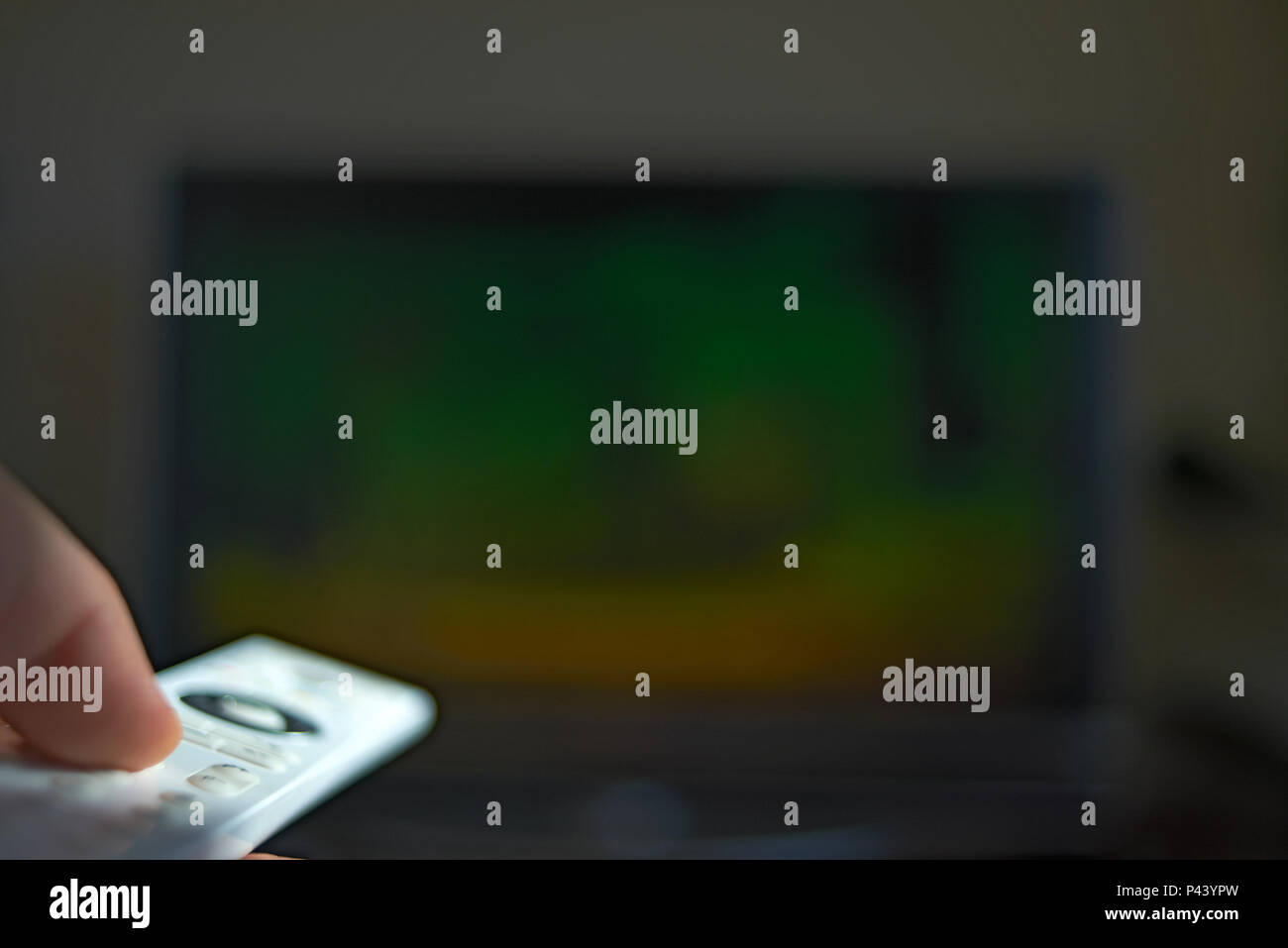 Pointing remote at netflix hi-res stock photography and images - Alamy