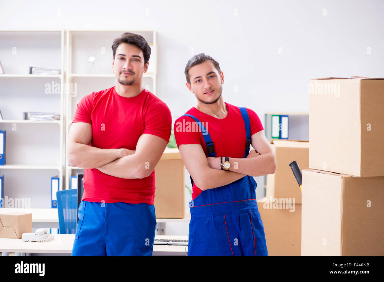 Warehouse employees carrying boxes hi-res stock photography and images ...