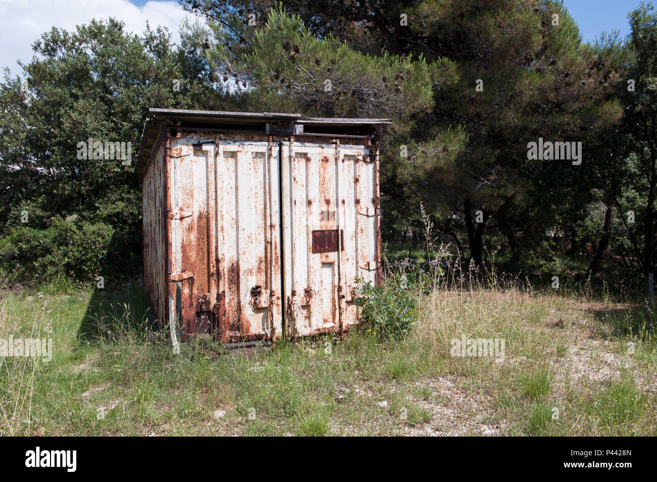 Old rusty metal container Stock Photo - Alamy