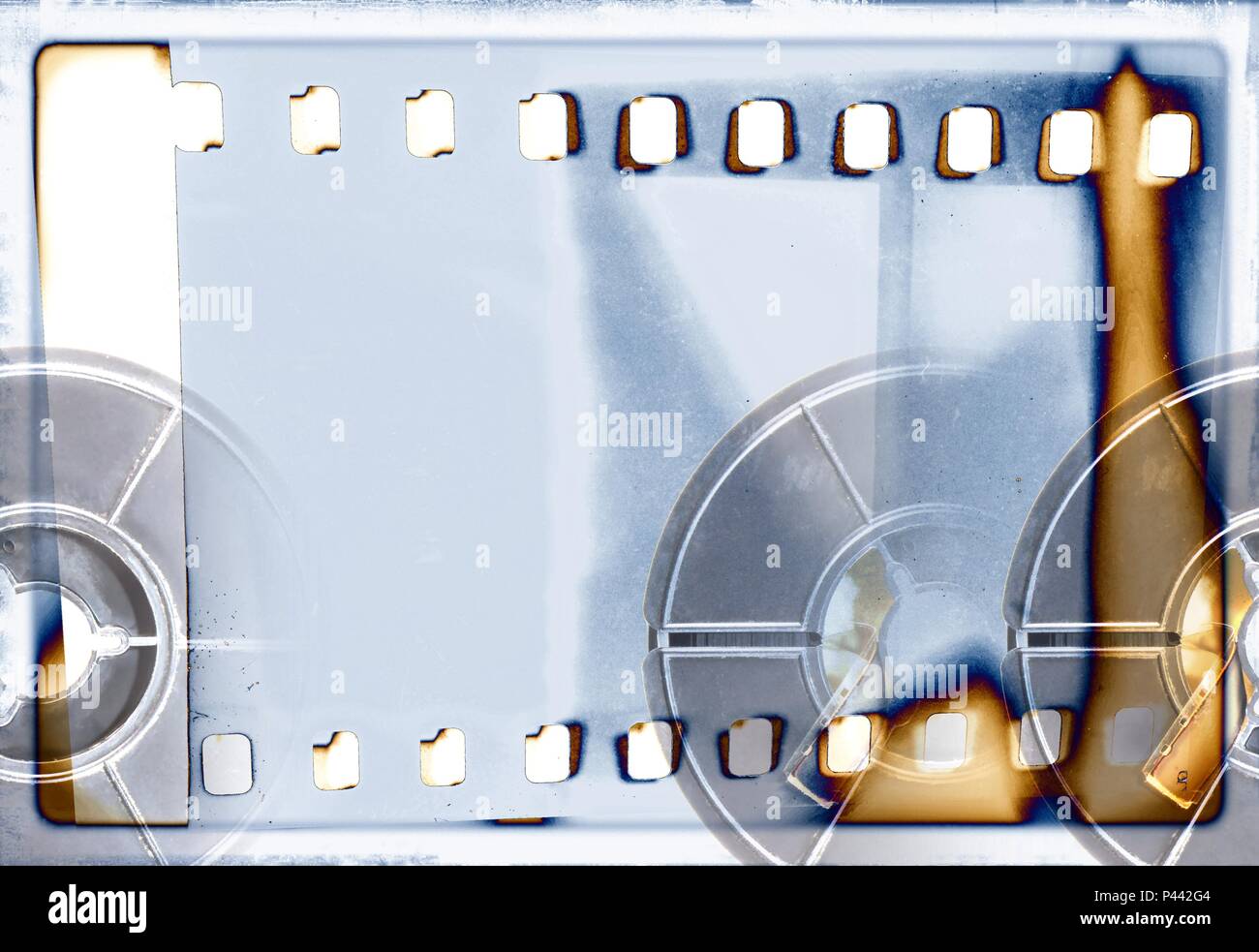 Vintage blue film strip frame with coils on old and damaged paper ...