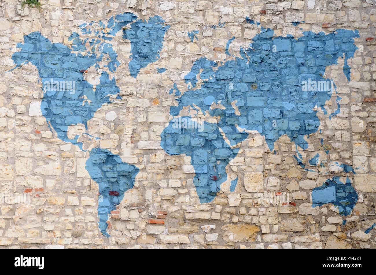 Blue world map on damaged stone wall. elements of this image furnished ...