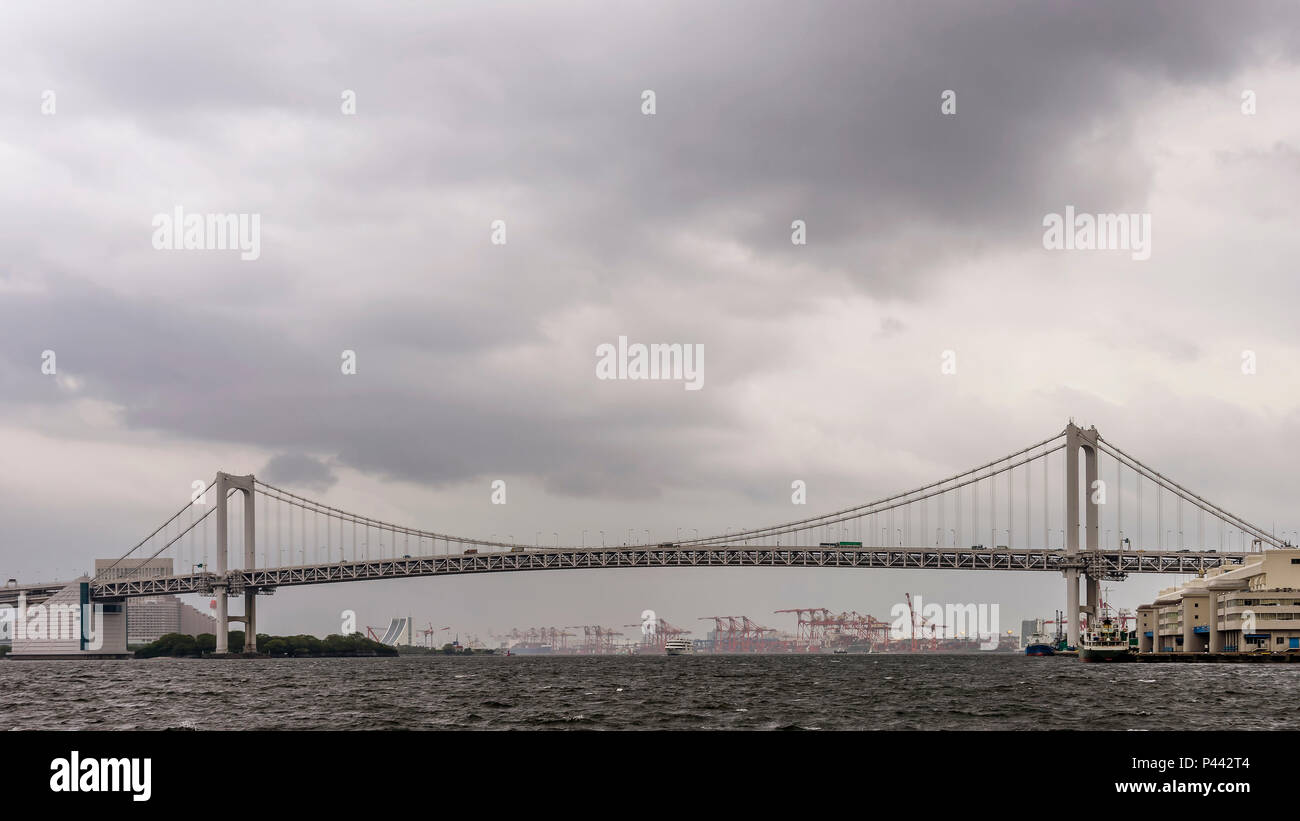 Panoramic view of the Rainbow Bridge in Tokyo, Japan, on a rainy day ...