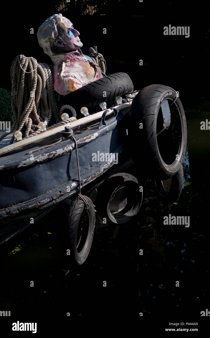 Statue on a narrow boat on the Regent's canal in London,England,UK ...