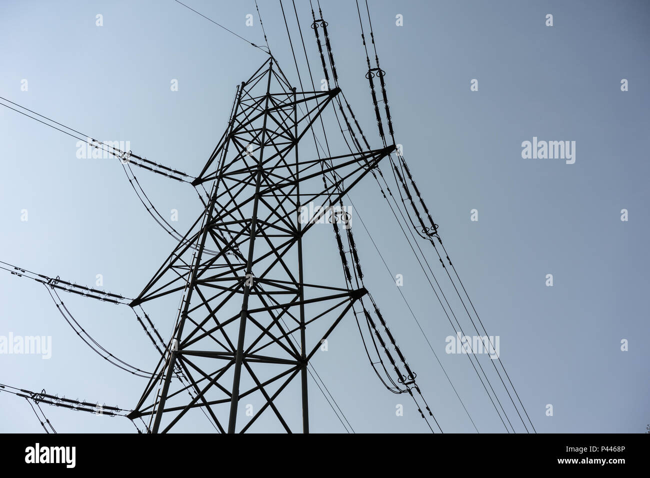 Power Tower industry pole for electricity, close up with cloudy dark ...