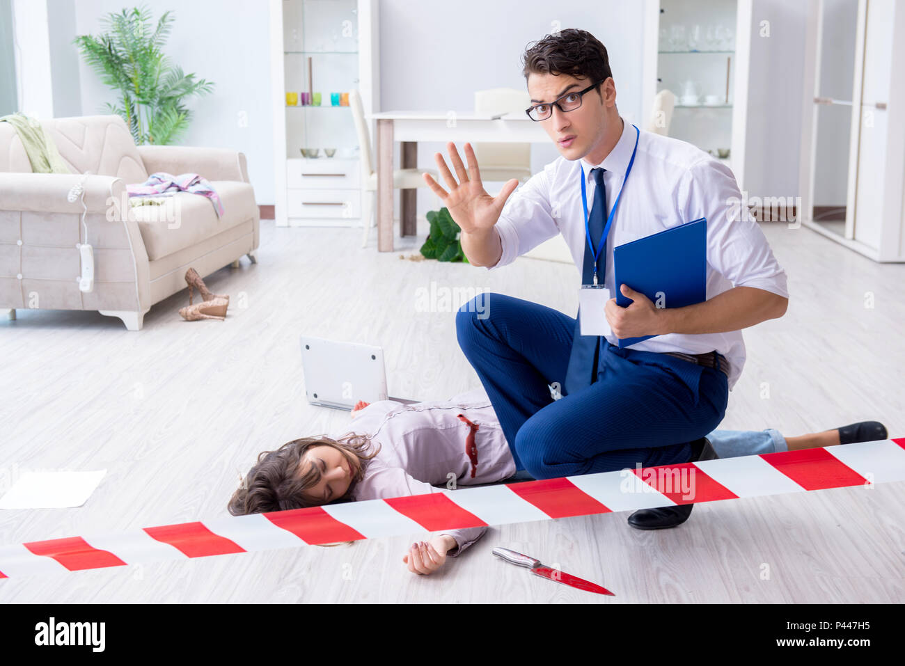 Forensic investigator at the crime scene investigating woman murder ...