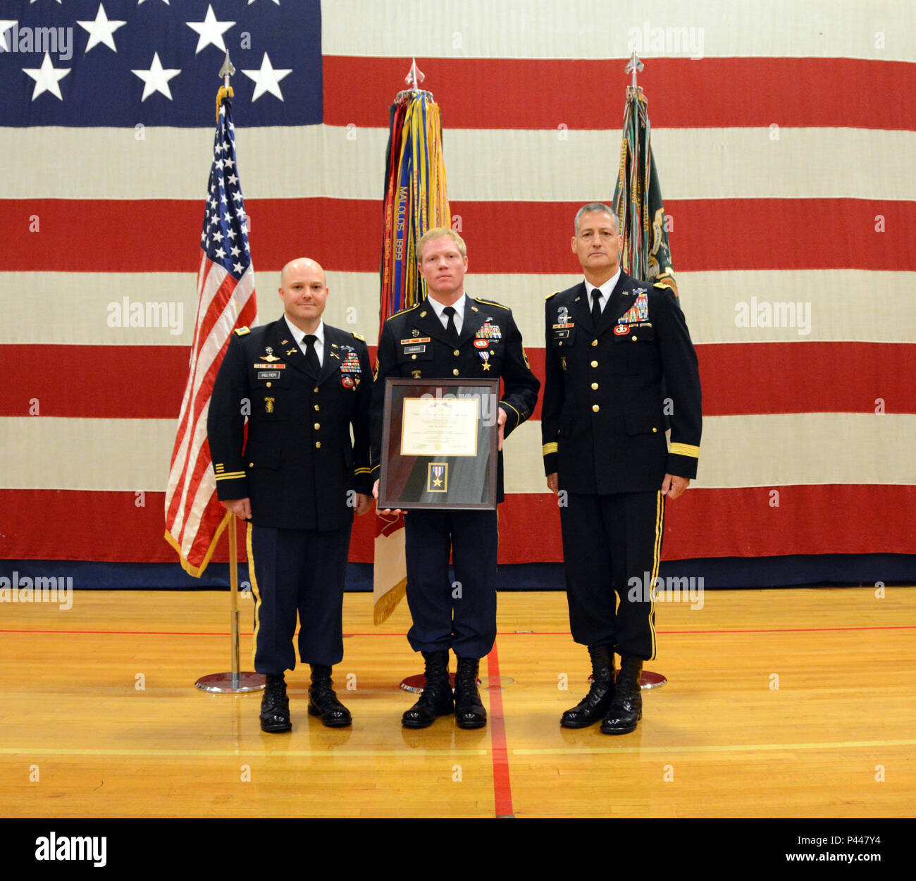 Sgt. 1st Class Richard Harris (center), a special forces soldier with ...
