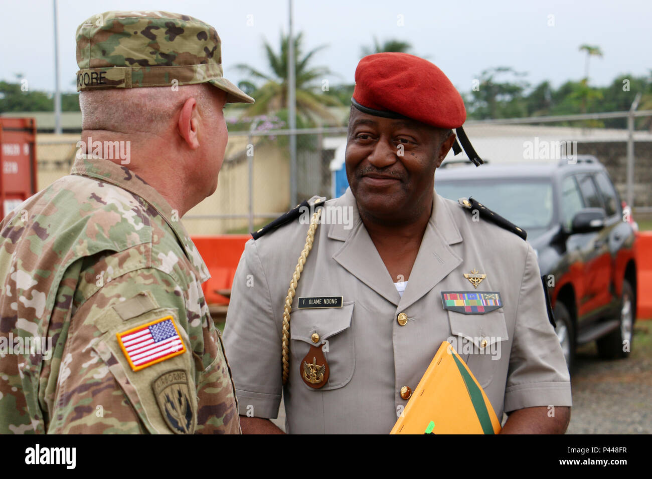 Brig. Gen. Ferdinand Gaspard Olame Ndong (right), deputy chief of the ...