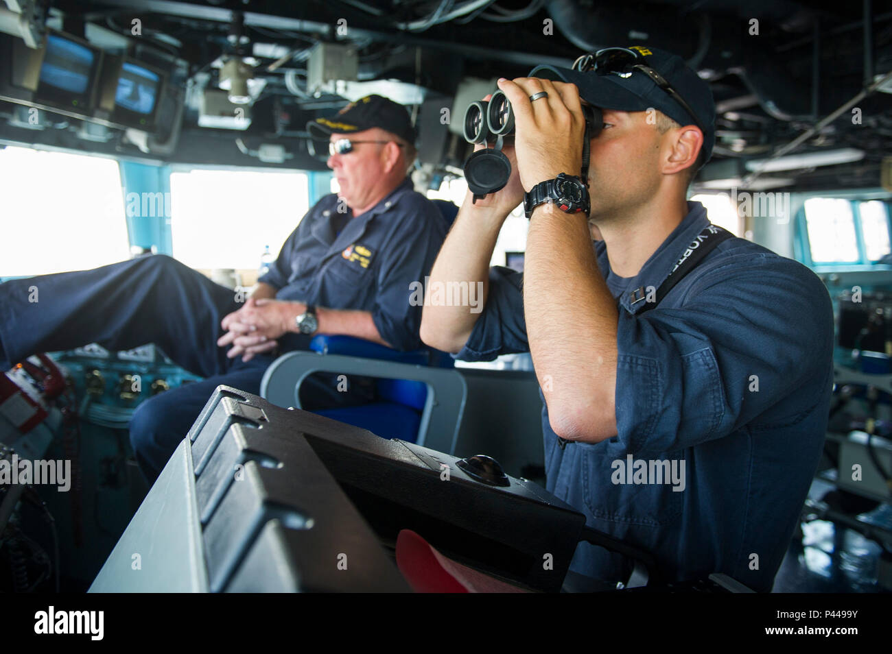 160608-N-VE959-054 SUEZ CANAL (June 8, 2016) Lt. Jeffery Ledford stands ...