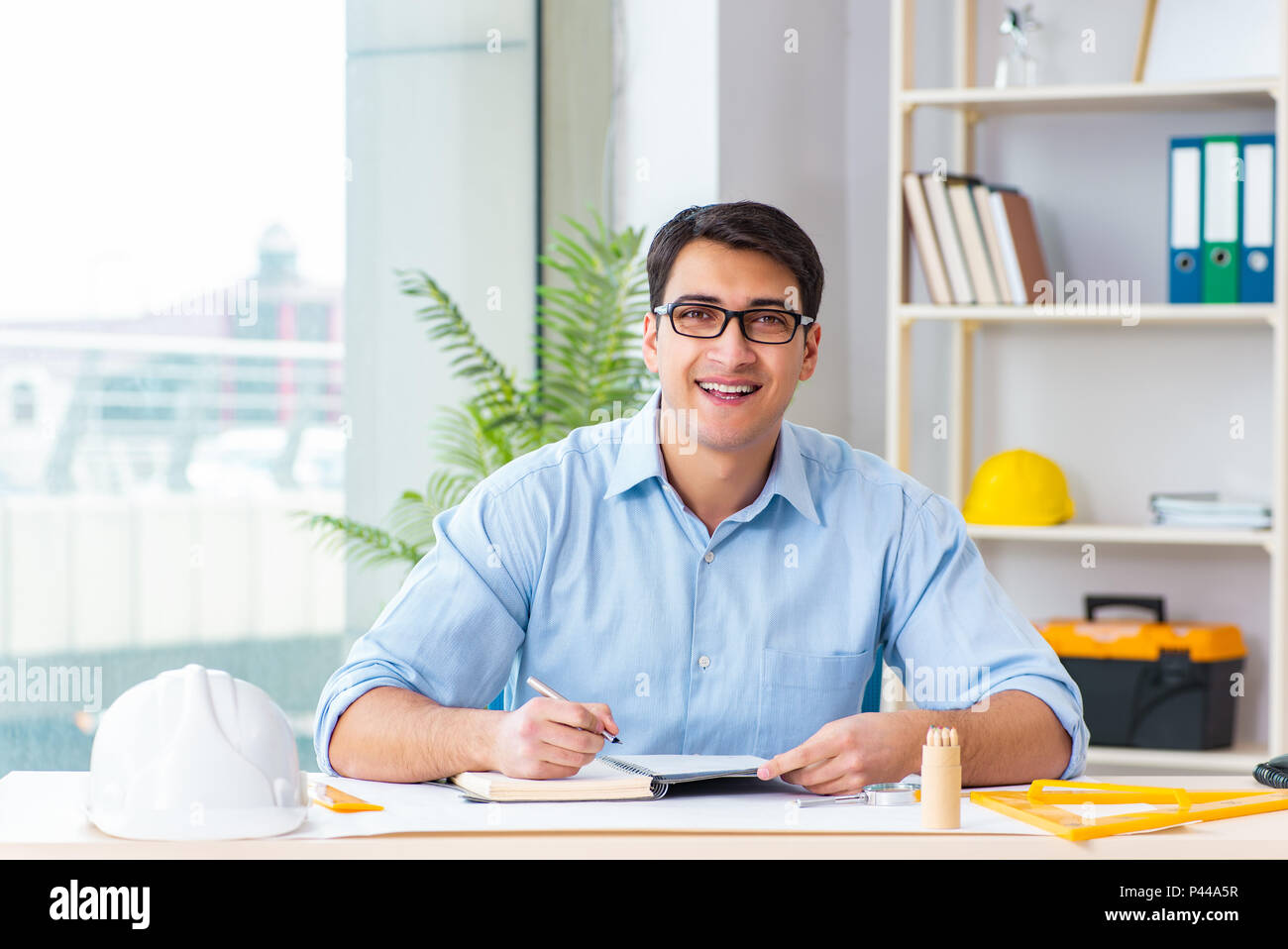 Construction engineer working on new project Stock Photo - Alamy