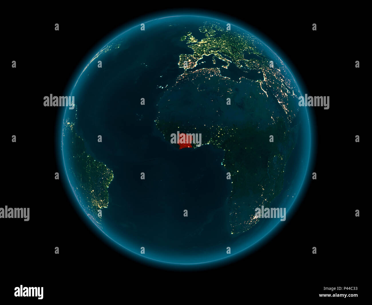 Night above Ivory Coast highlighted in red on model of planet Earth in ...
