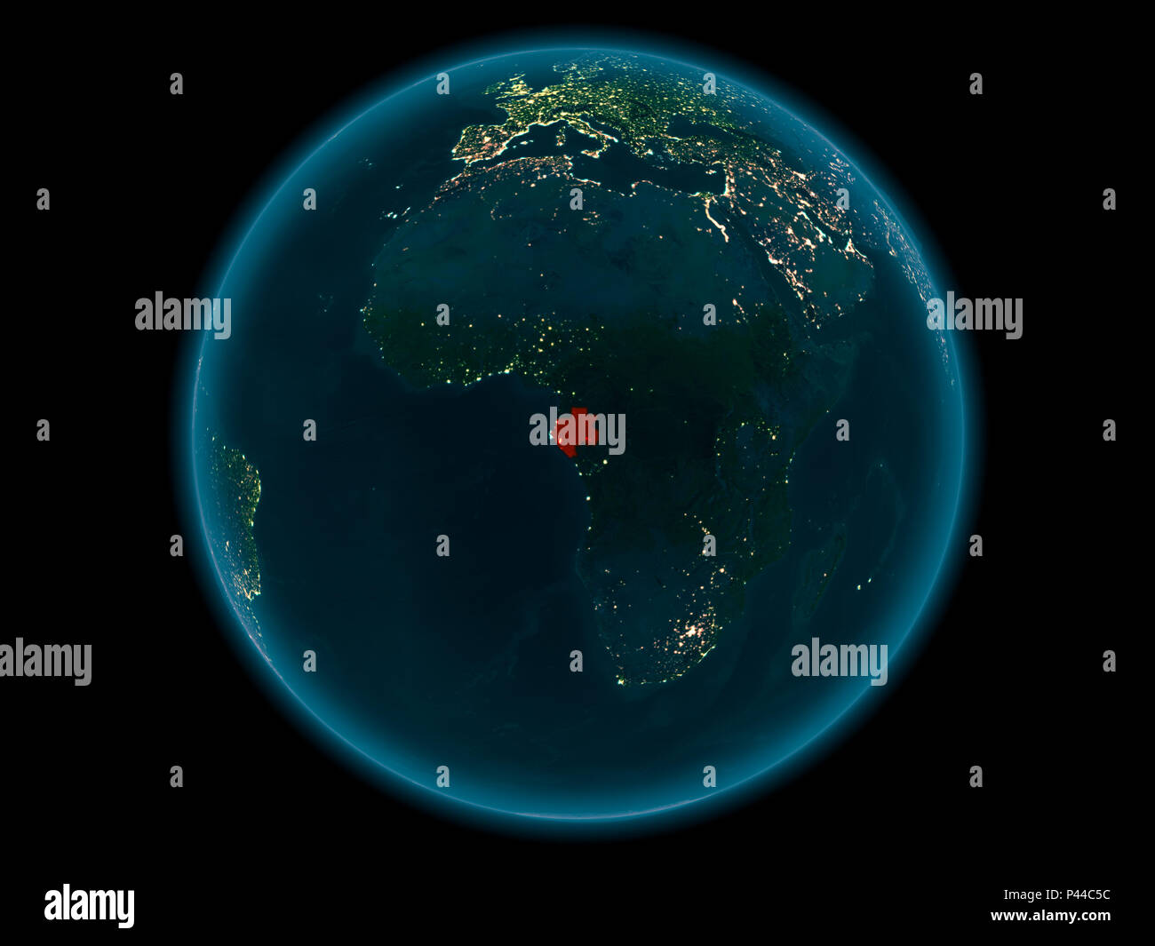 Night above Gabon highlighted in red on model of planet Earth in space ...