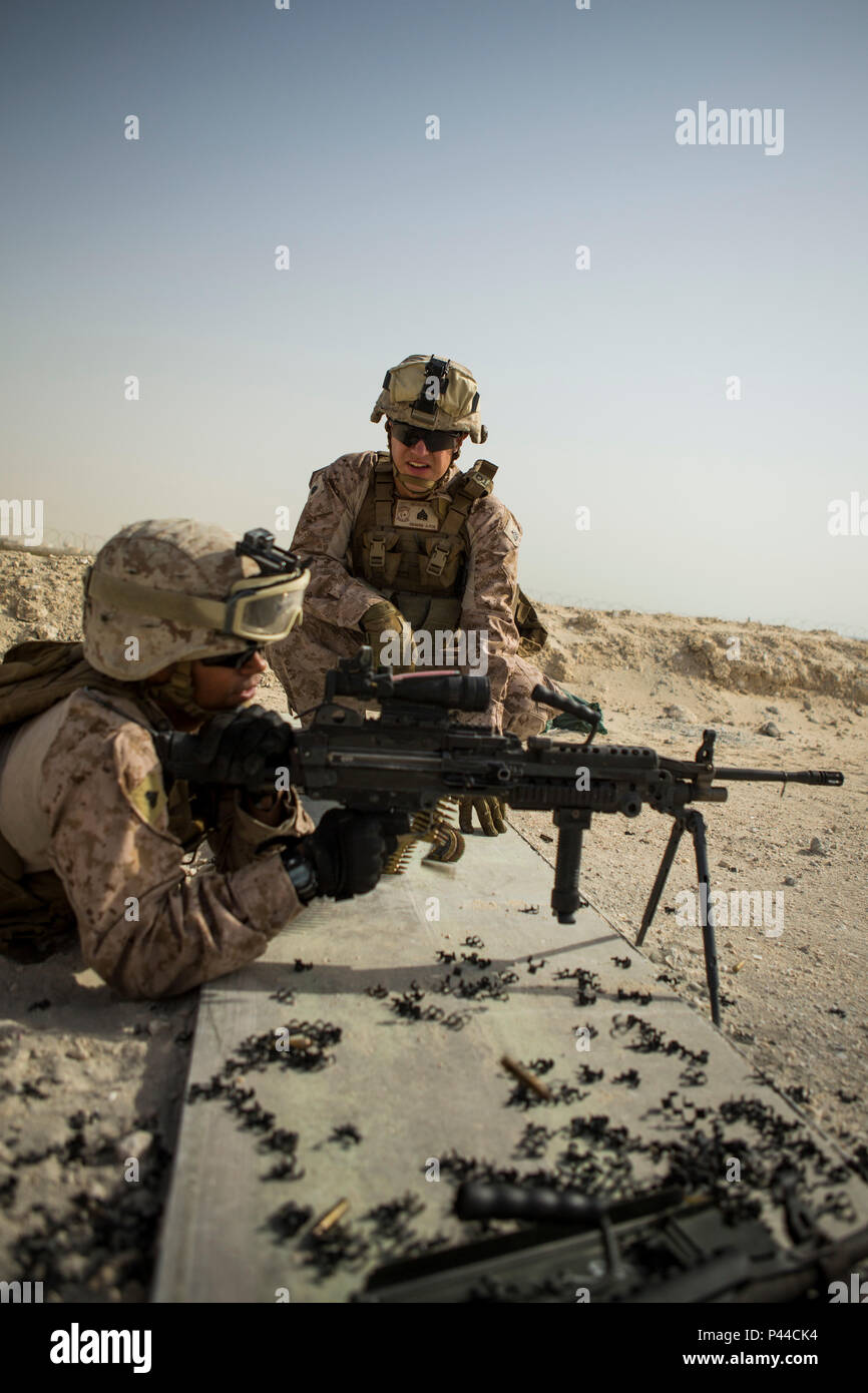 U.S. Marine Corps Sgt. Ryan Benson (center), a squad leader with ...
